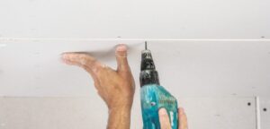 Repairing damage to plasterboard - Step-by-step guide and video